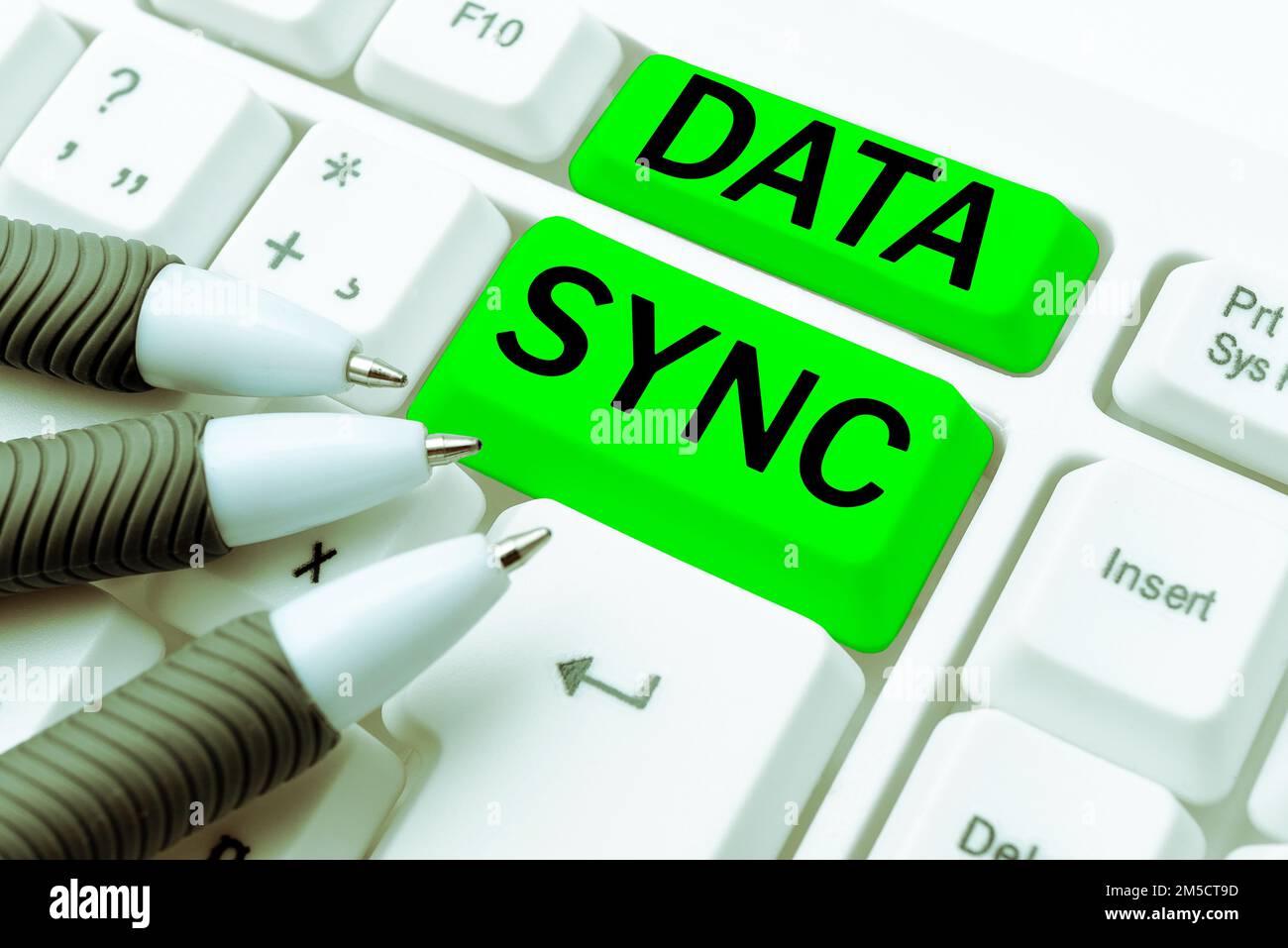 Hand writing sign Data Sync. Internet Concept data that is continuously generated by different ...