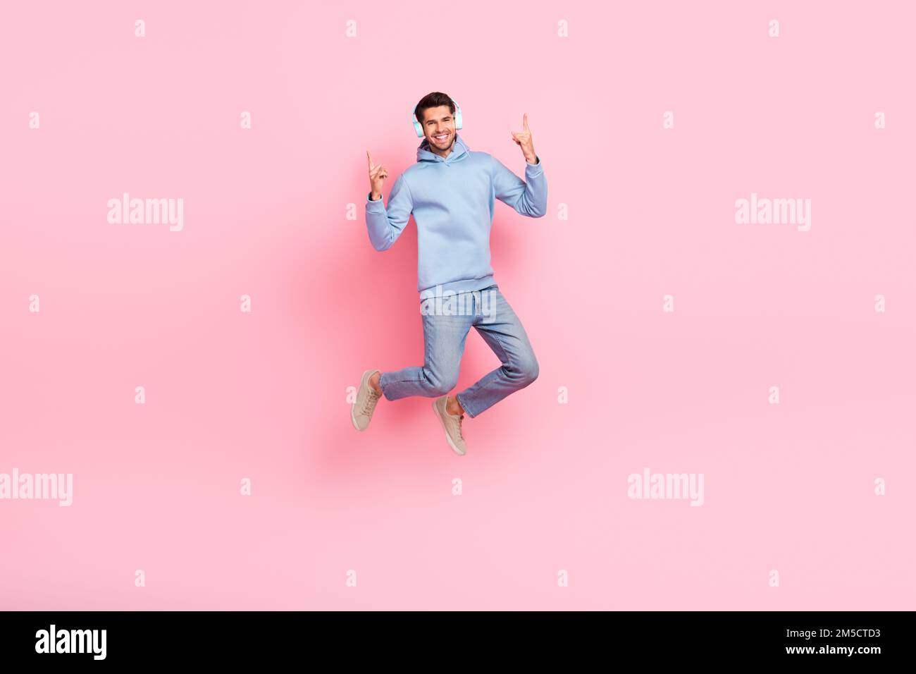 Photo of attractive funky man wear blue stylish clothes listening heavy ...