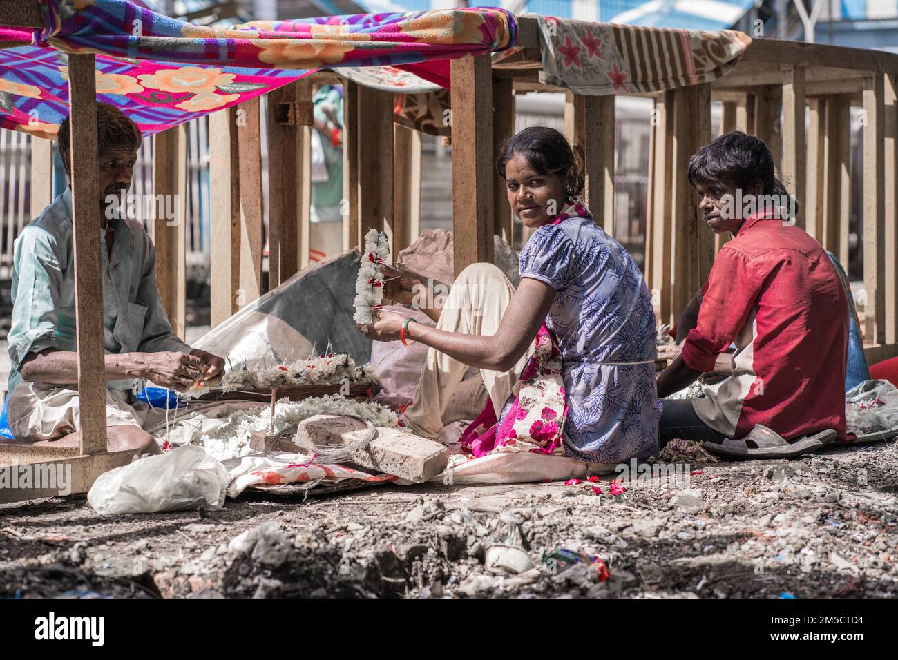 A selective of Mumbai street workers working near the railway station ...