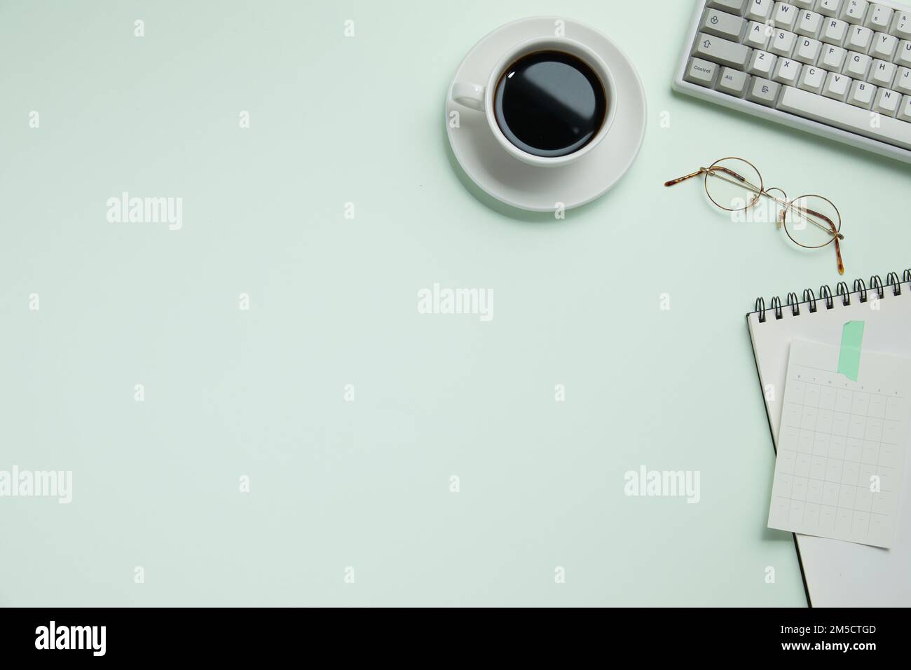 Assorted office supplies on the desk Stock Photo - Alamy