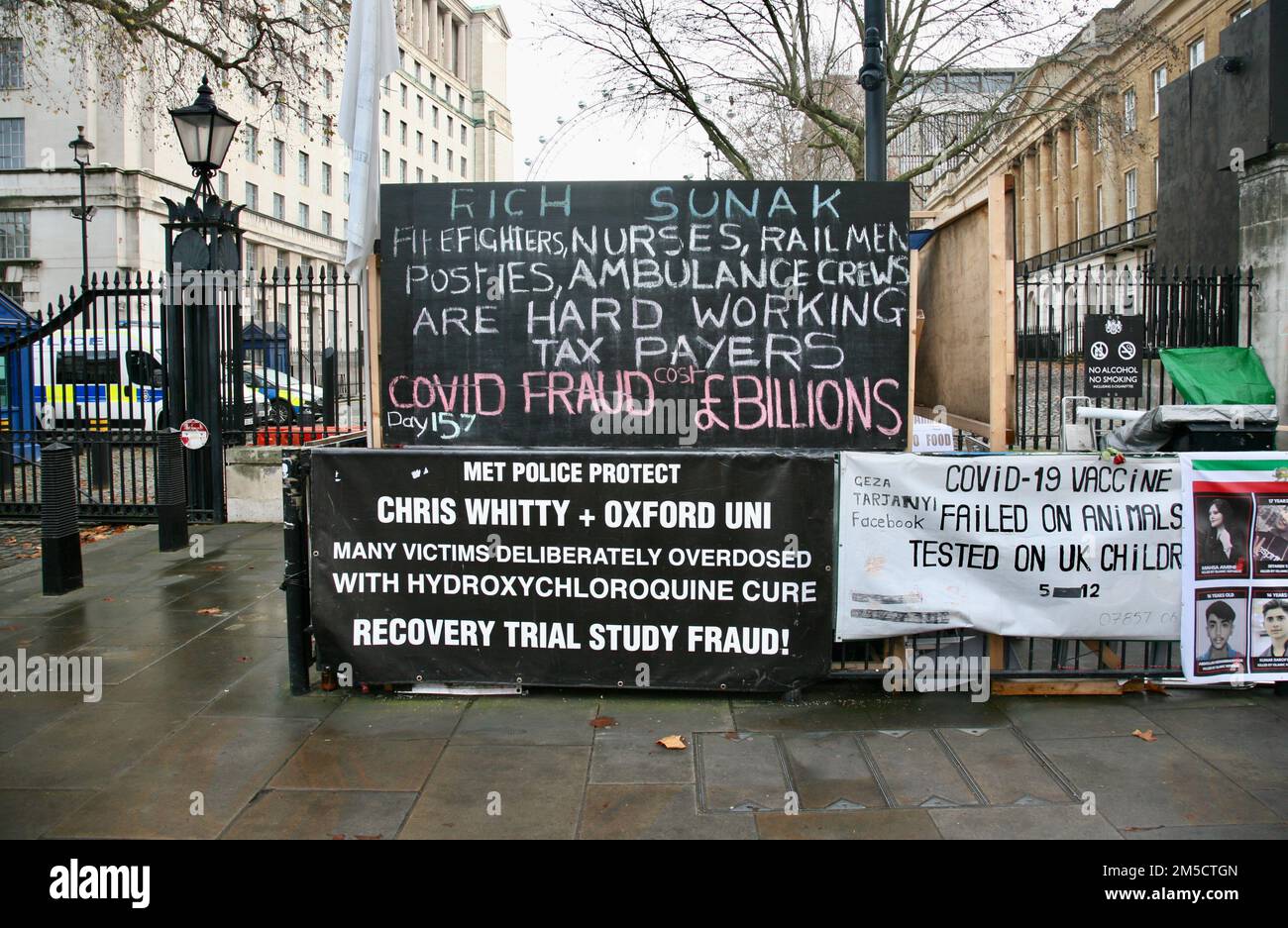 A huge demonstration sign at the entrance to Downing Street, City of ...