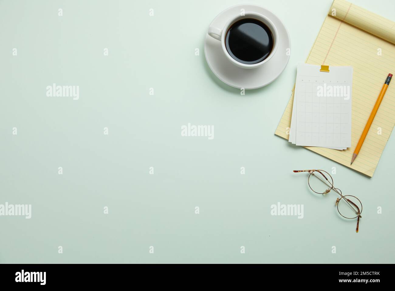 Assorted office supplies on the desk Stock Photo - Alamy