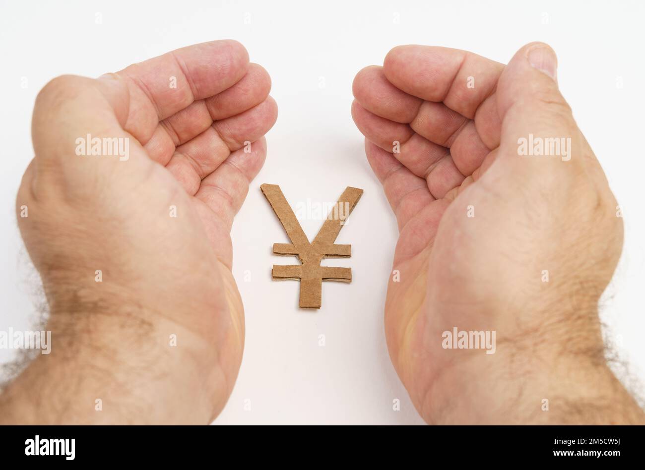 On a white background, the symbol of the yen - the yuan, a person's ...