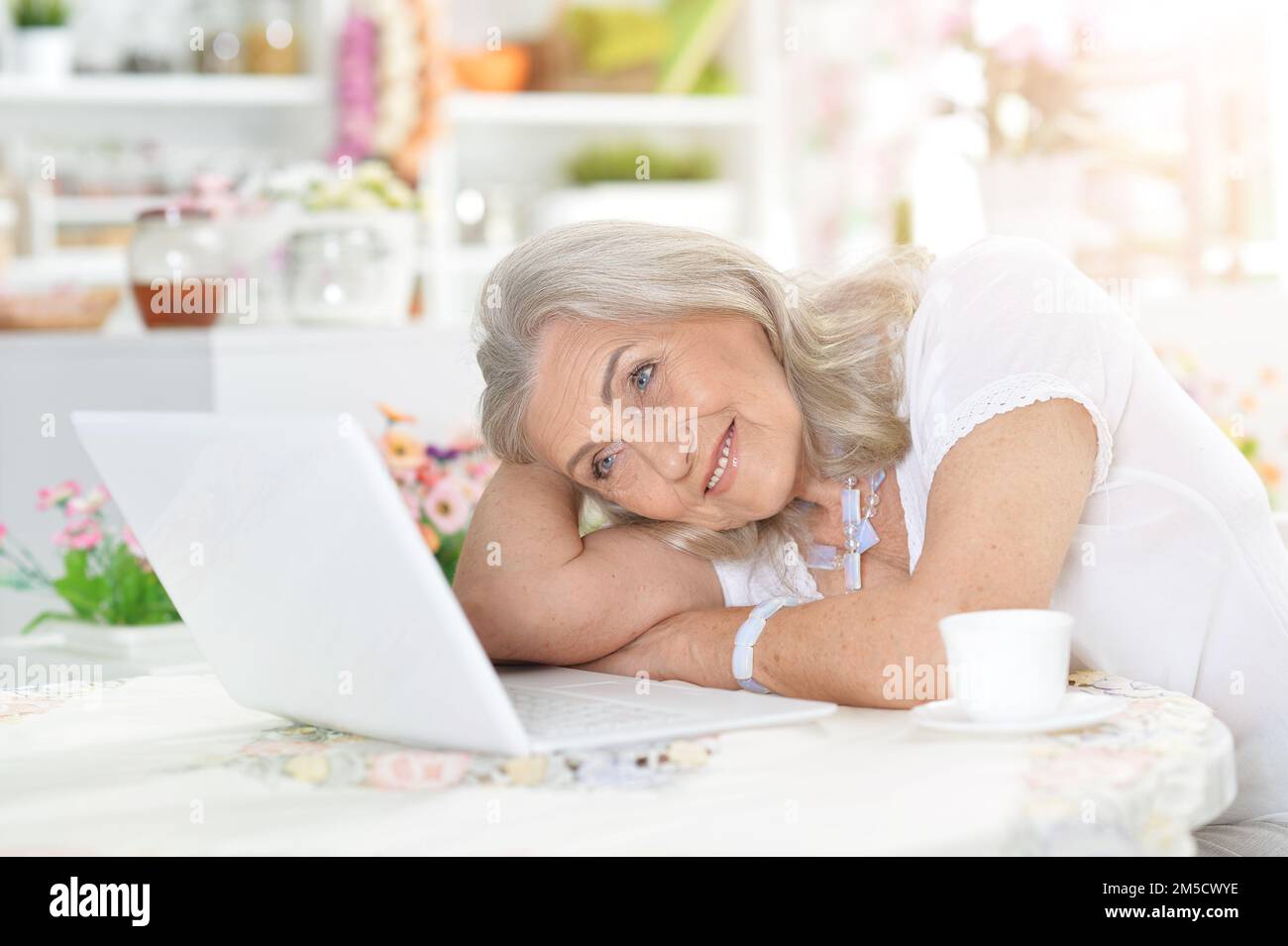 Nice old woman using hi-res stock photography and images - Alamy