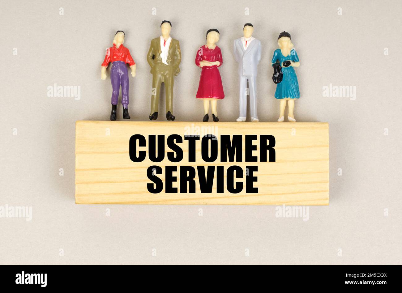 Business concept. On the block with the inscription - Customer Service ...