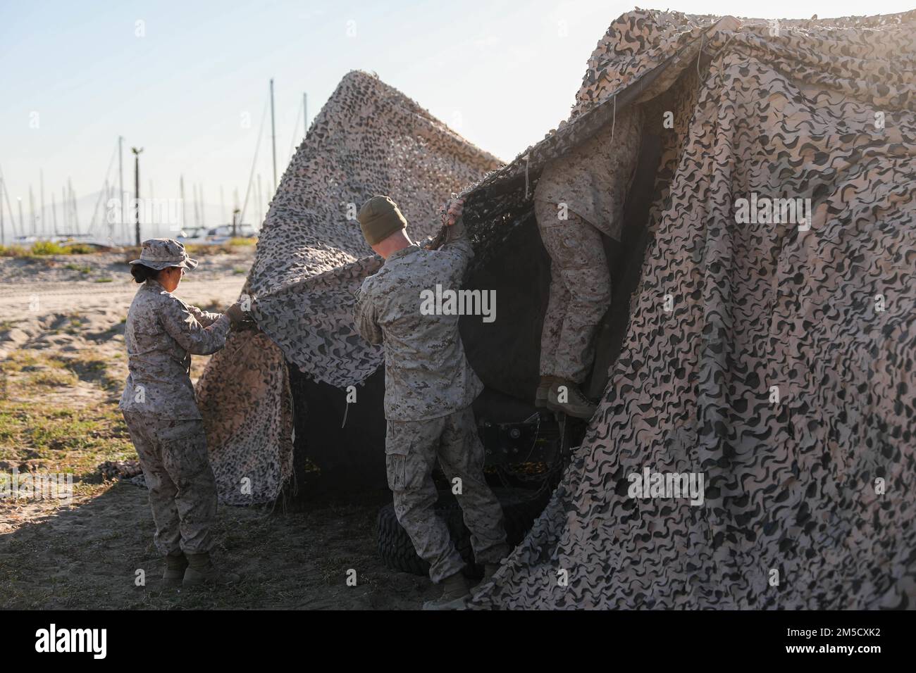 U.S. Marines with 7th Marine Regiment, 1st Marine Division, stretch ...