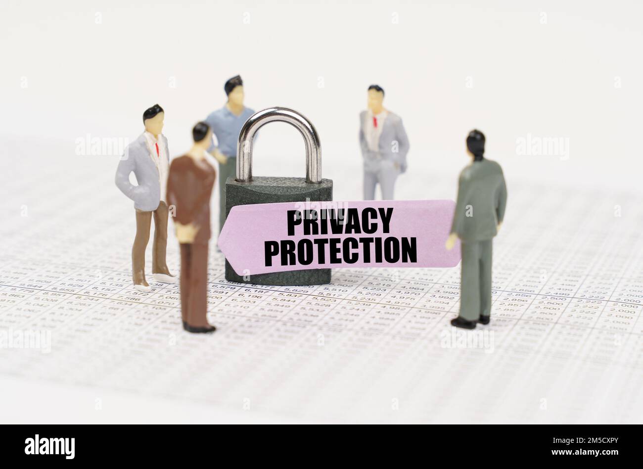 The concept of security in business. There are figures of people on ...