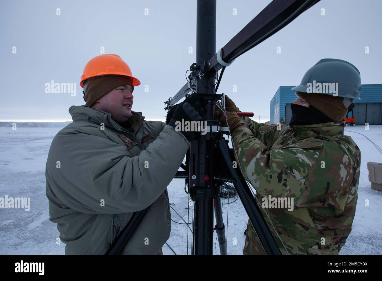 168th Wing Communications Flight Airmen Staff Sgt. Shawn McCarthy (left ...