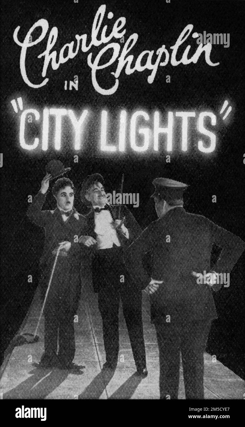 CHARLIE CHAPLIN as The Tramp HARRY MYERS and HARRY AYERS in CITY LIGHTS ...