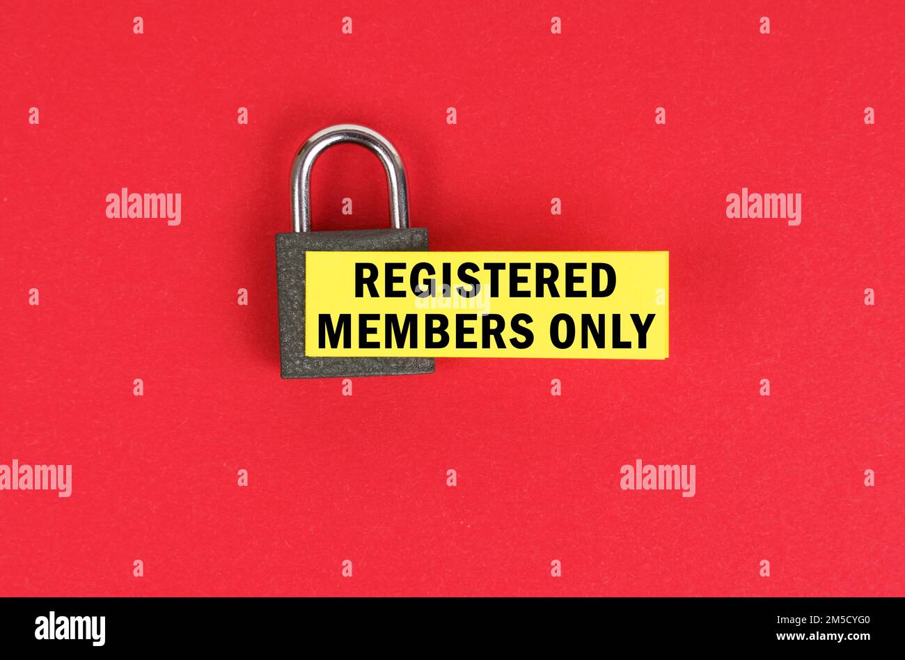 Business and security concept. On the red surface there is a lock with ...