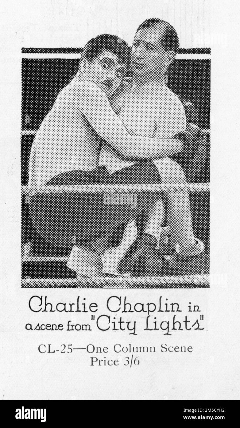 CHARLIE CHAPLIN as The Tramp and HANK MANN as a Boxer in CITY LIGHTS ...