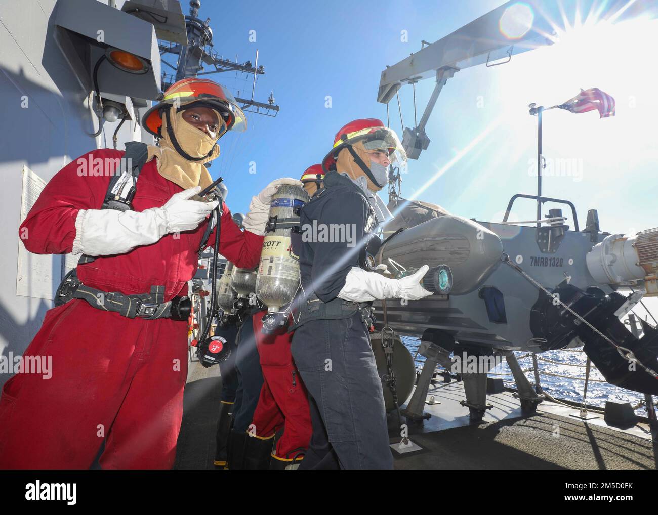 PHILIPPINE SEA (March 2, 2022) Sailors put out a simulated fire aboard ...