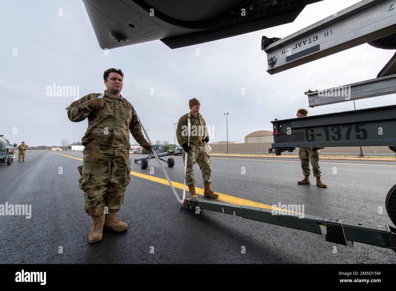 U.S. Air Force Staff Sgt. Adam Huebner, an air transportation ...