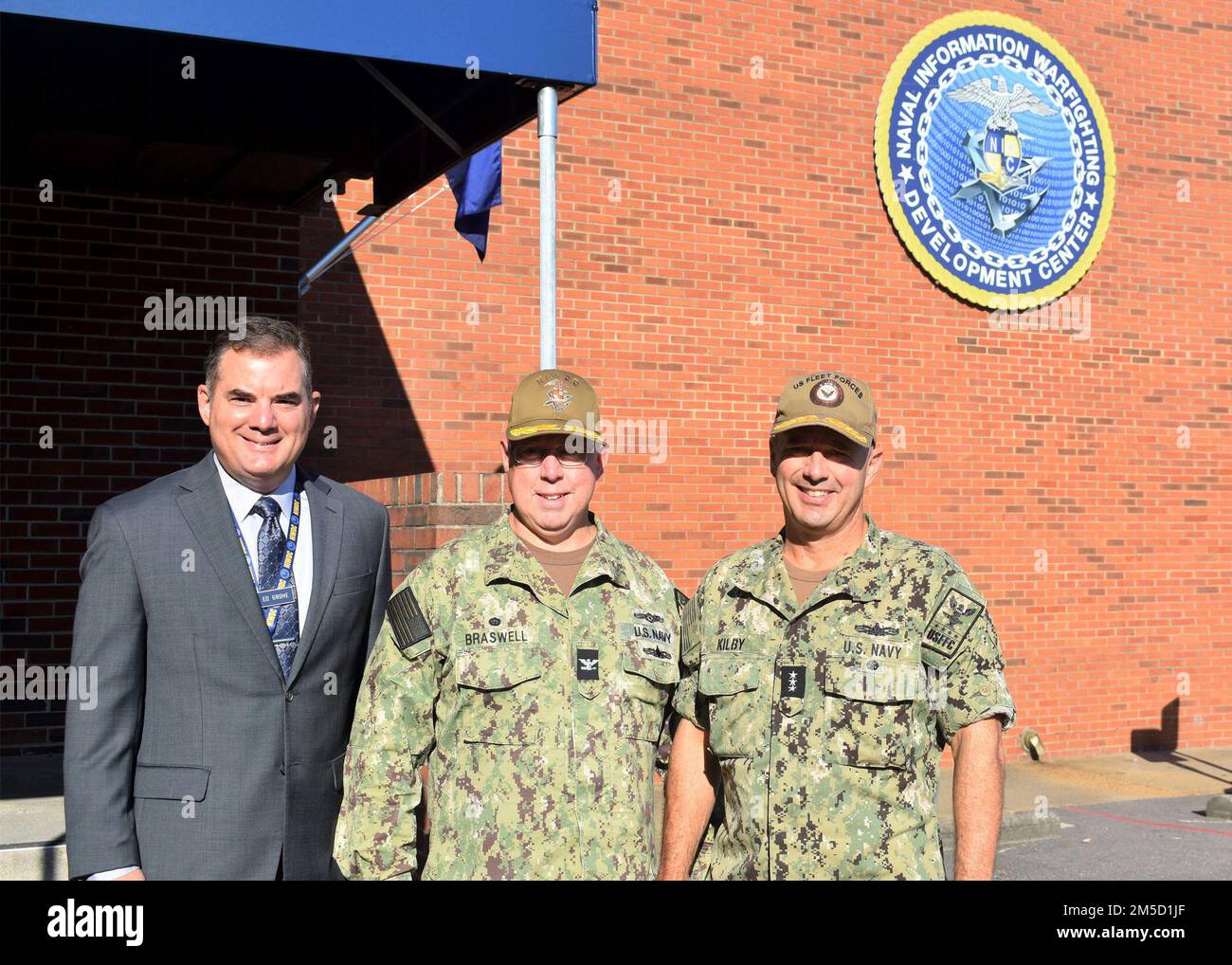 From the left, Mr. Edwin Grohe, technical director of Naval Information ...
