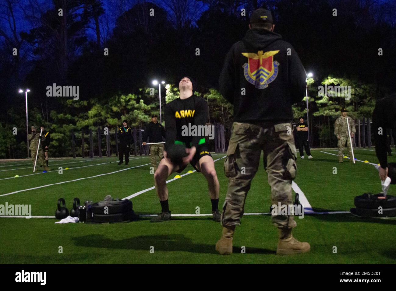 U.S. Army Staff Sgt. Jacob Elston performs the standing power throw ...