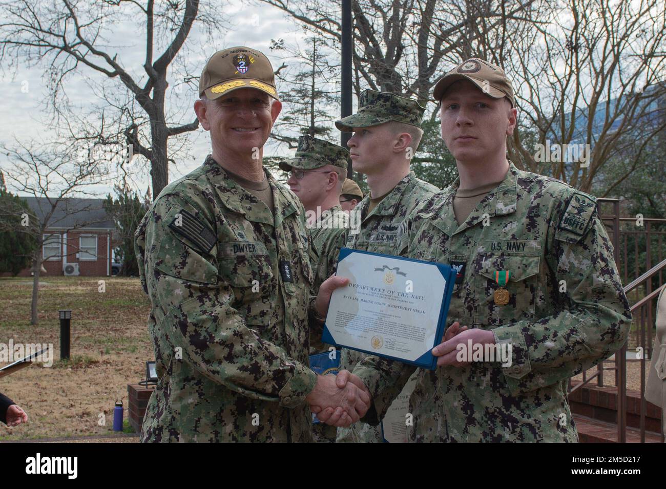 NORFOLK, Va. (March 3, 2021) Utilitiesman 2nd Class Marc Burns receives ...
