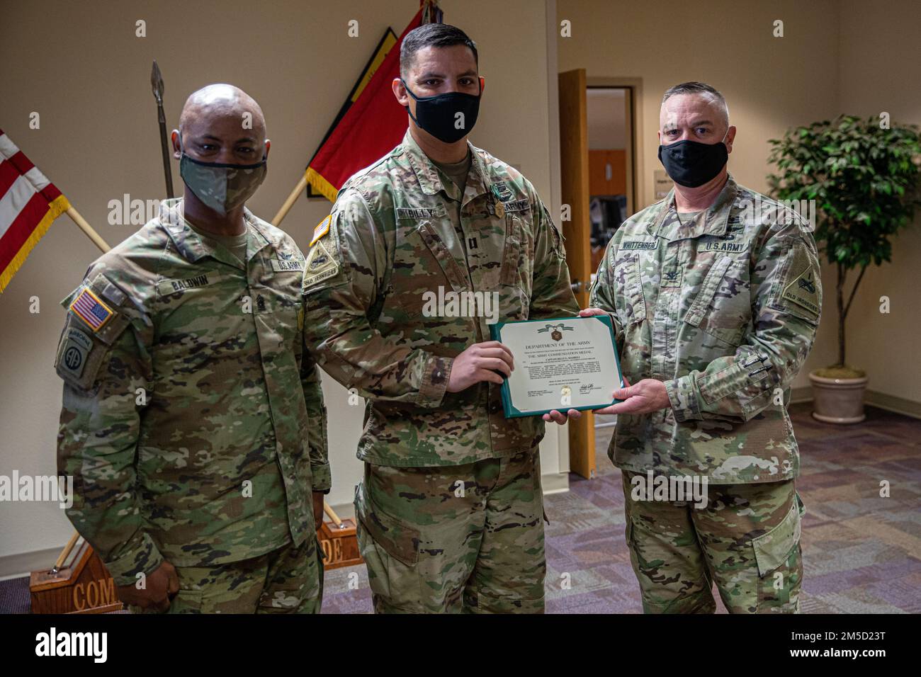 CPT Masheli Billy receives a PCS award at his farewell ceremony on ...