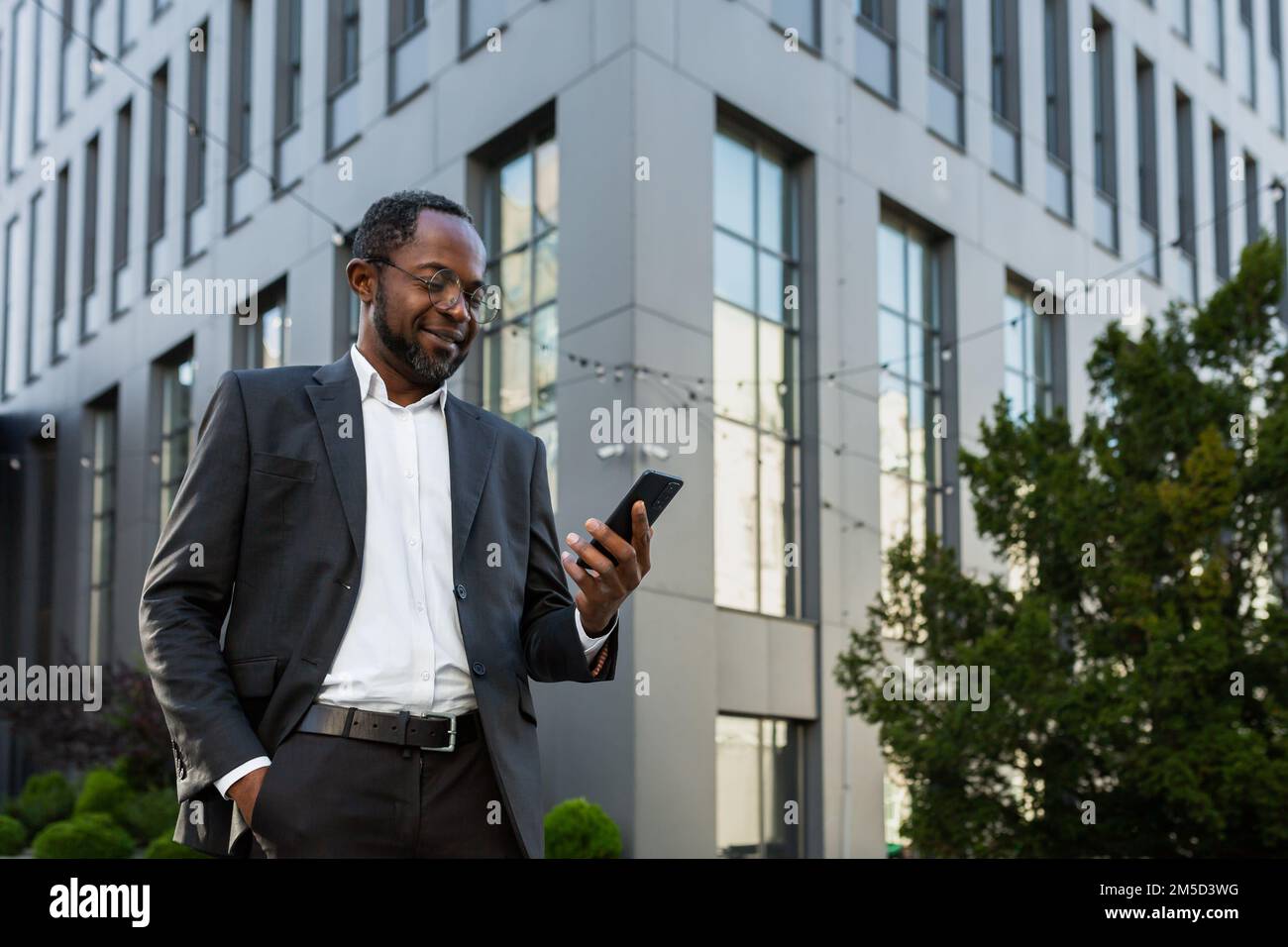 Business mature man texting hi-res stock photography and images - Alamy