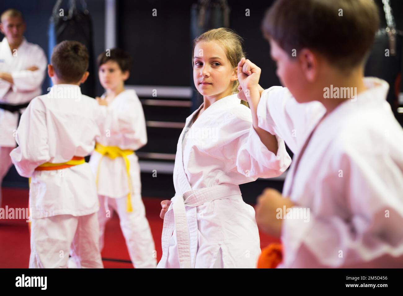 Boys and girls in kimono sparring together Stock Photo - Alamy