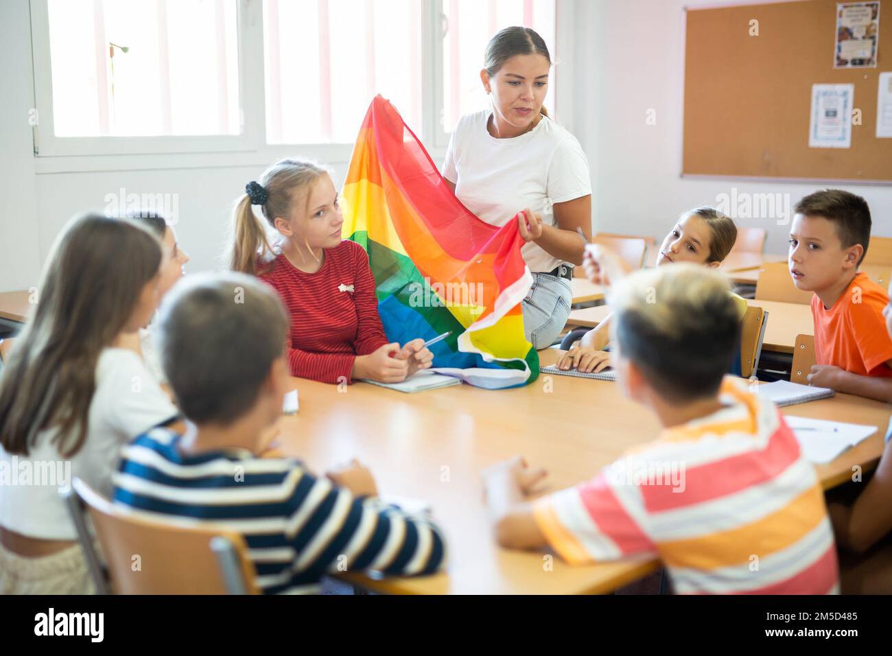 Kids attending to teacher's lecture about LGBT Stock Photo - Alamy