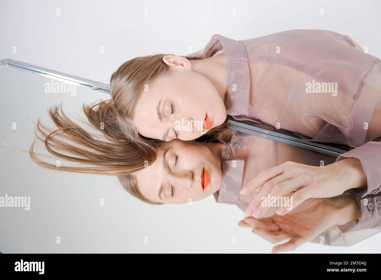 Self-realization portrait woman in mirror image. Unusual strange pretty ...