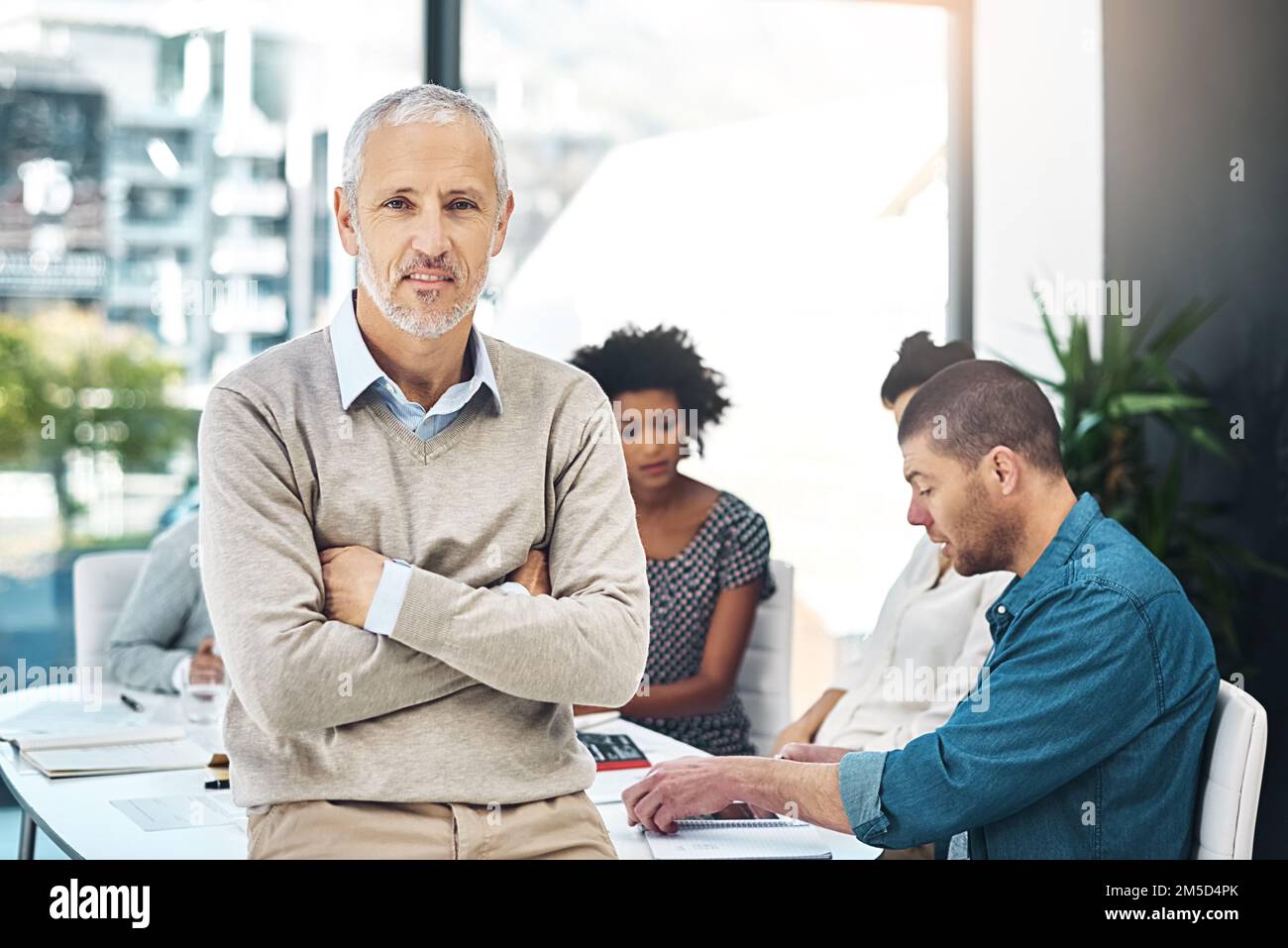 Were making success look easy. Portrait of a businessman standing in a ...