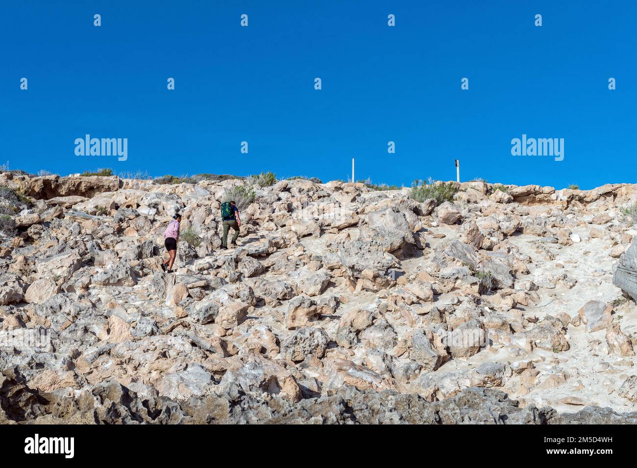 Arniston, South Africa - Sep 22, 2022: People walking back to the ...