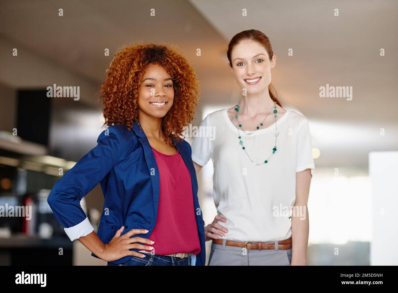 The dynamic duo. Portrait of two confident young businesswomen standing ...