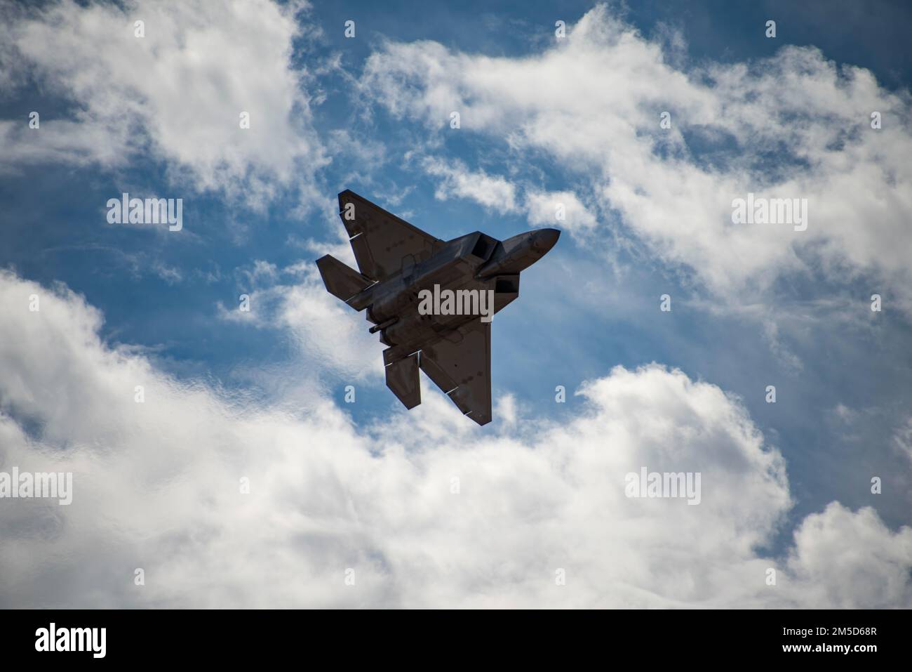 A U.S. Air Force F-22 Raptor performs aerial maneuvers during the ...