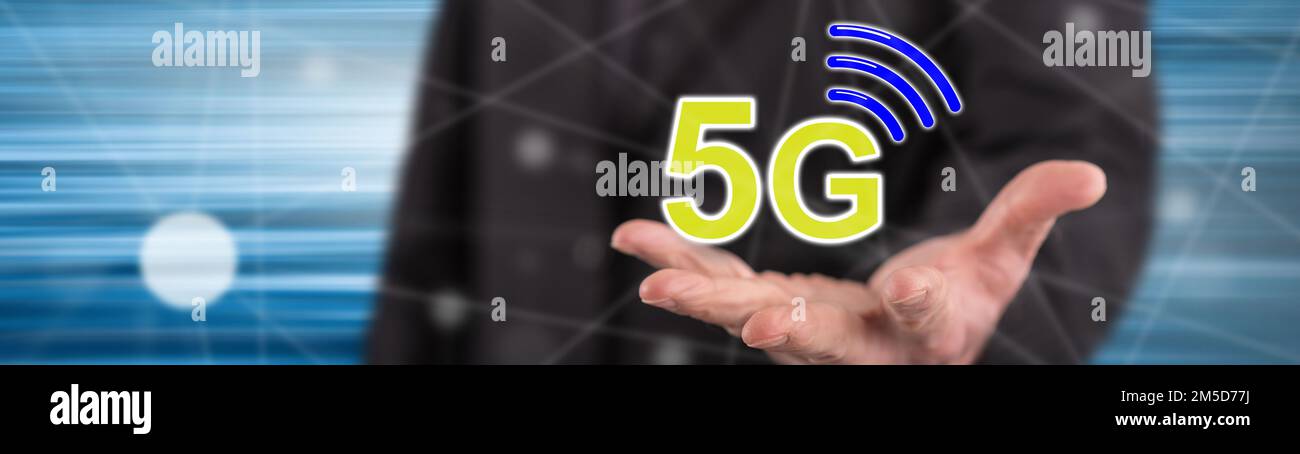 5g concept above the hand of a man in background Stock Photo - Alamy
