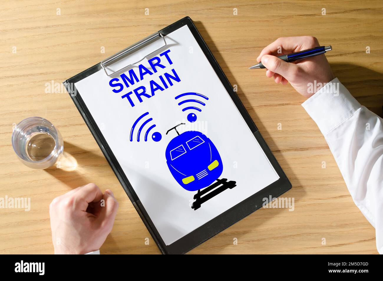 Smart train concept on a clipboard Stock Photo - Alamy