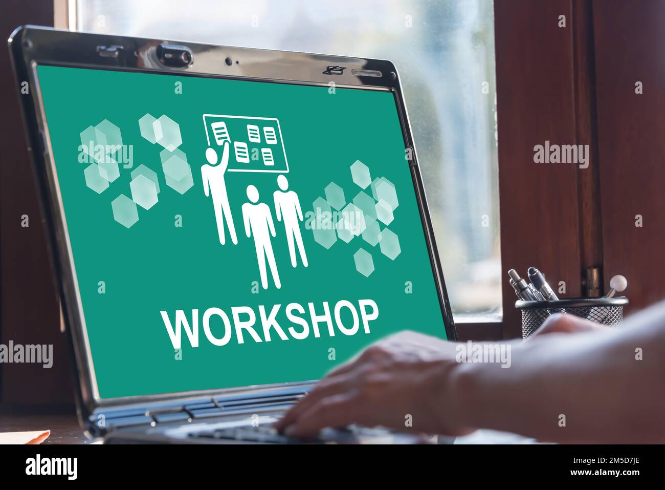 Laptop screen displaying a workshop concept Stock Photo - Alamy