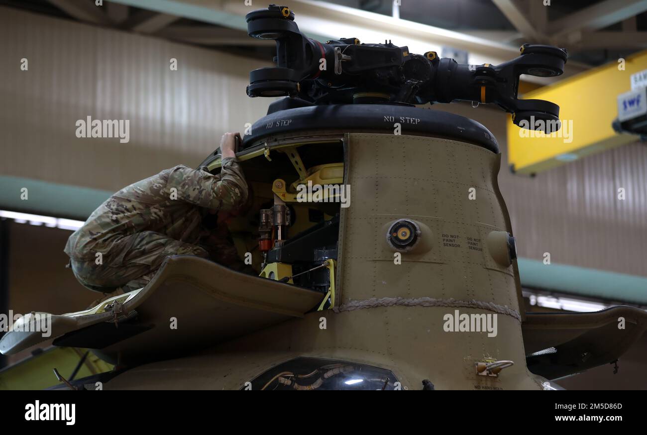 A CH-47 Helicopter Repairer assigned to Bravo Company, 602nd Aviation ...