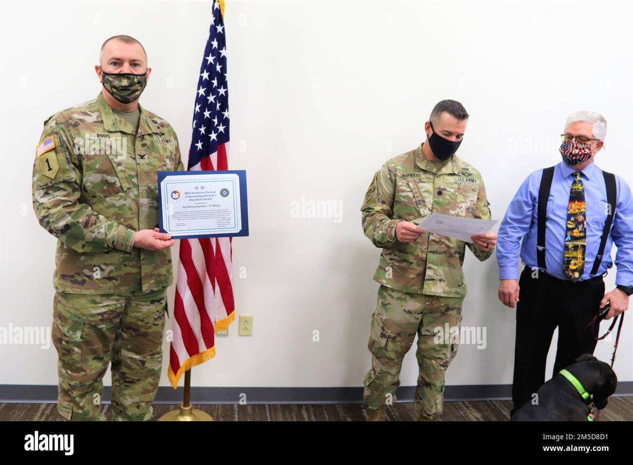 Fort McCoy Garrison Commander Col. Michael Poss holds a special ...