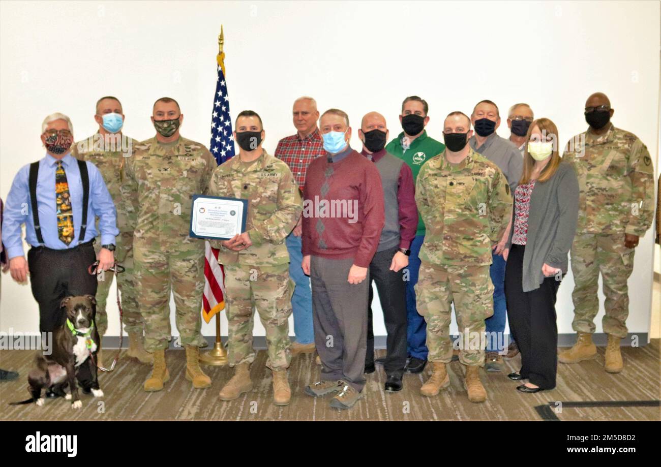 Members of the Fort McCoy, Wis., Garrison team stop for a photo March 3 ...