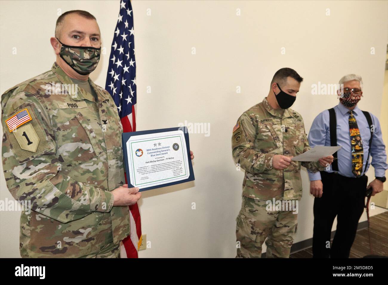 Fort McCoy Garrison Commander Col. Michael Poss holds a special ...