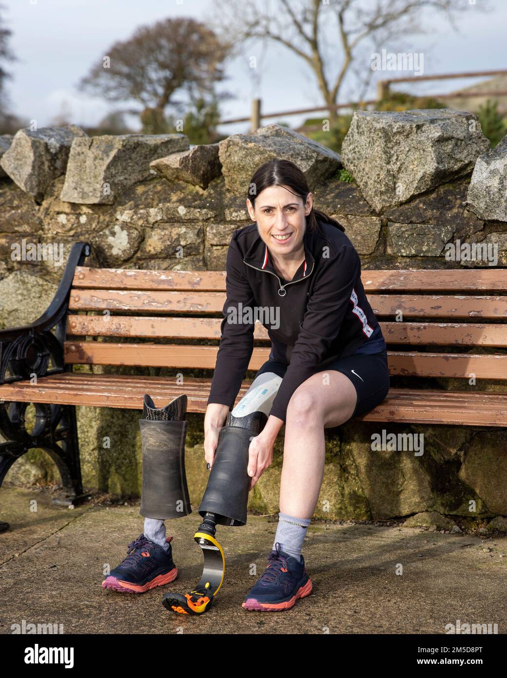 Rosie Tennyson at Camlough Lake in Co Armagh, putting on her prosthetic ...
