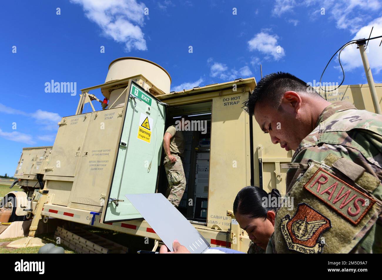 U.S. Air Force Airmen from the 297th Air Traffic Control Squadron go ...