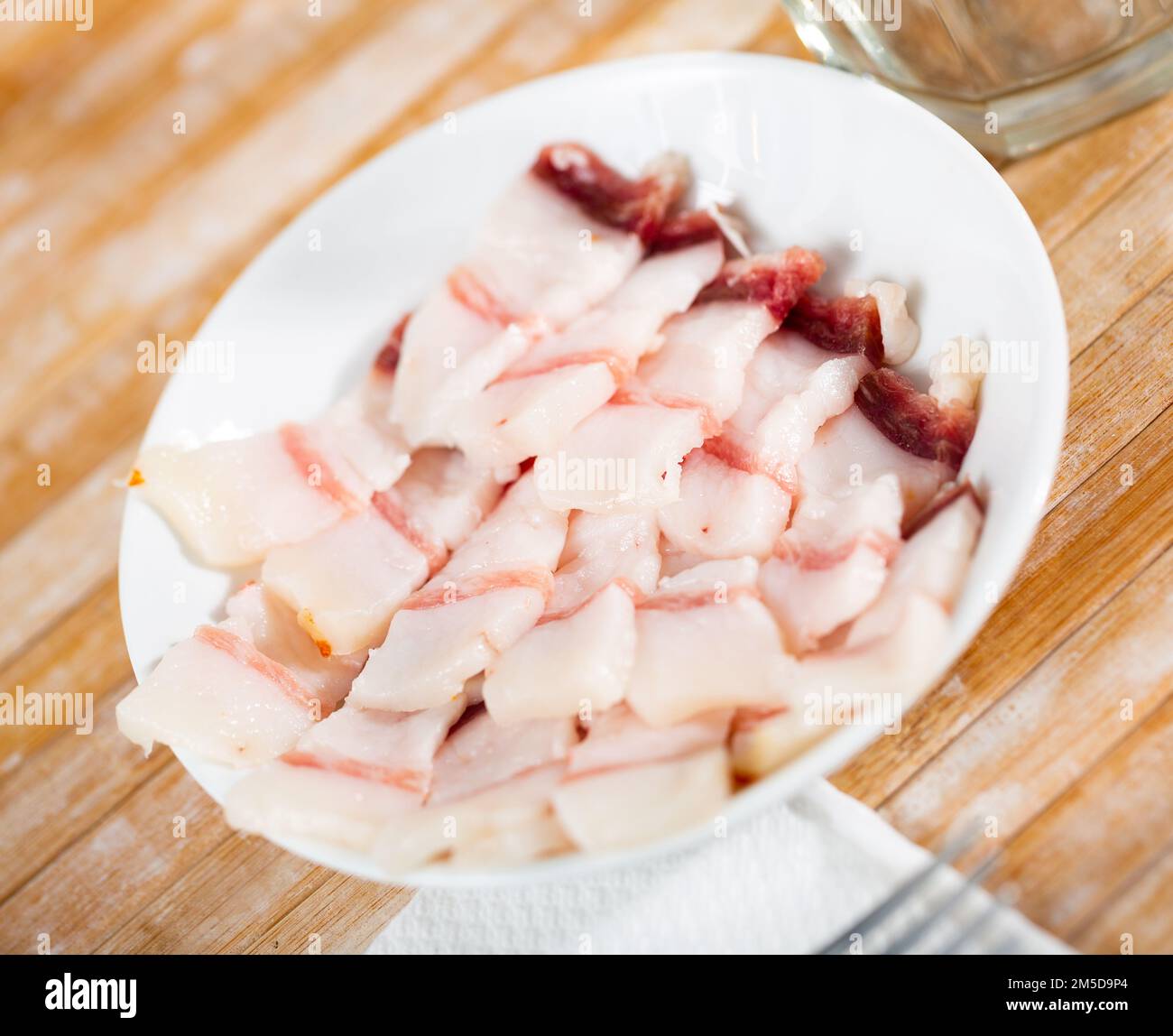 Sliced salted pork bacon with layers of meat Stock Photo - Alamy