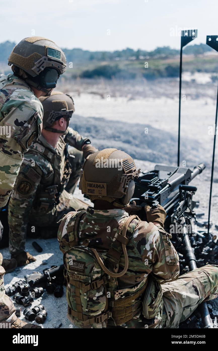 Airmen from the 822 Base Defense Squadron conduct heavy weapons ...