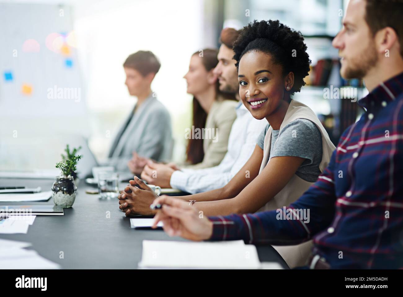 Roads that lead to success pass through hard work first. Portrait of a businesswoman sitting ...