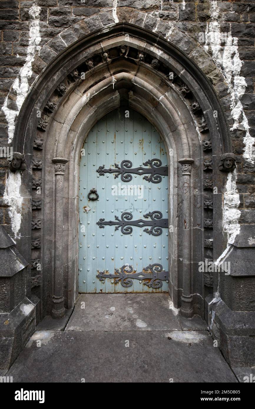 Wooden entrance door to St Twrog's church, LLandwrog, North Wales. UK ...