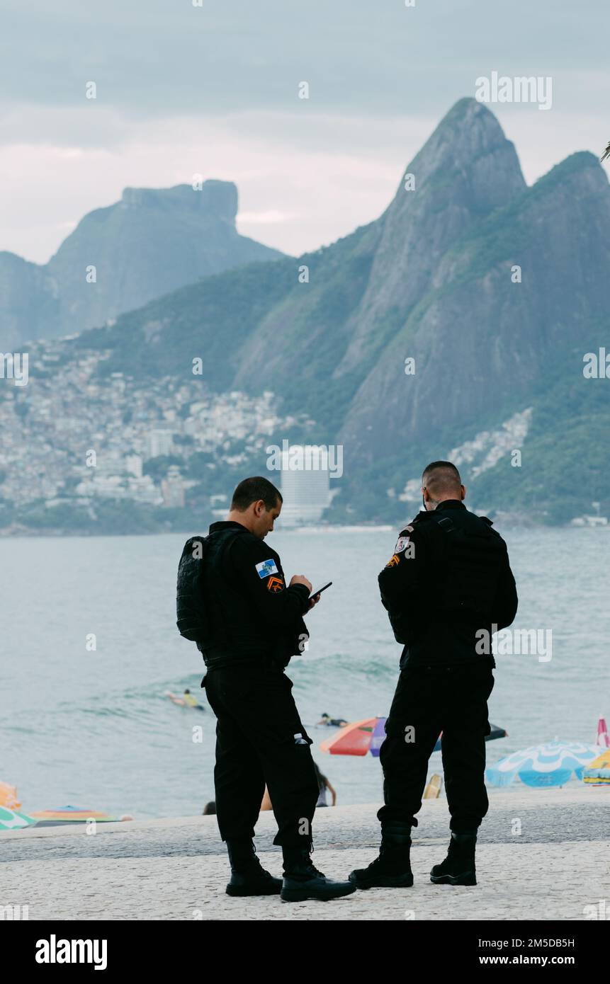 Police watch over tourists in Arpoador, Rio de Janeiro, Brazil Stock ...