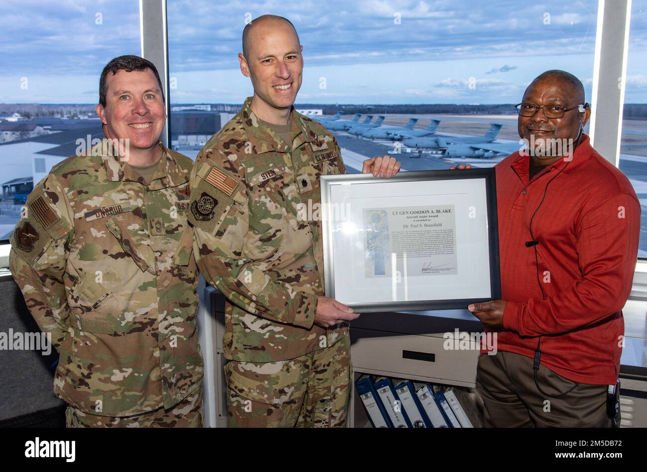 Chief Master Sgt. Daniel Unkrur, left, 436th Operations Group ...