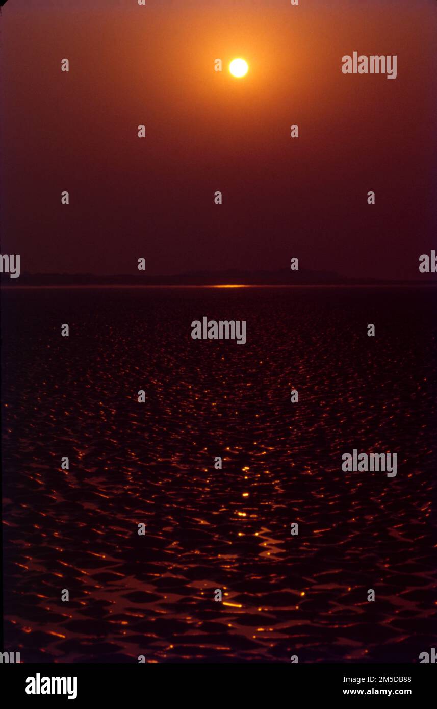 Sun Set's Reflection in Water, Safala, Maharashtra, India Stock Photo ...