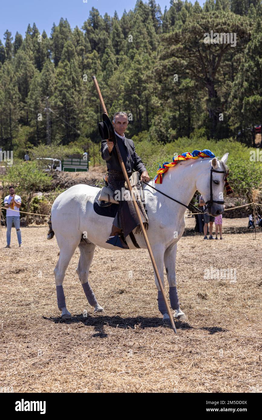 Andalucian horseman giving a display of traditional horsemanship and ...