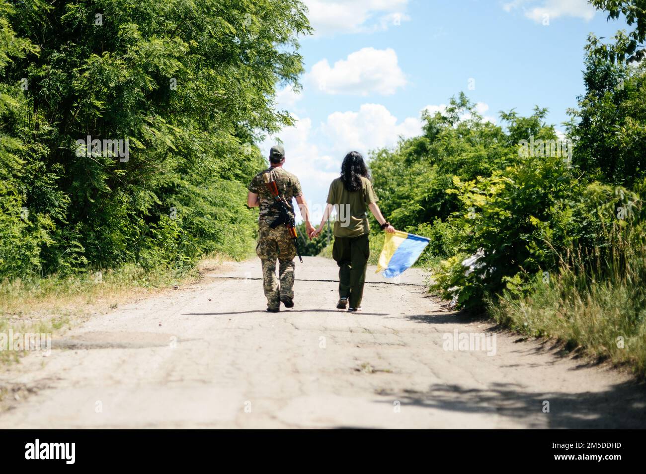 Ukrainian military defender with his wife, portrait of a young couple ...