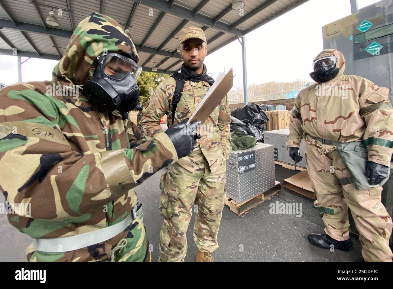 U.S. Air Force Airman 1st Class Stanley Lu, left, with the 129th ...