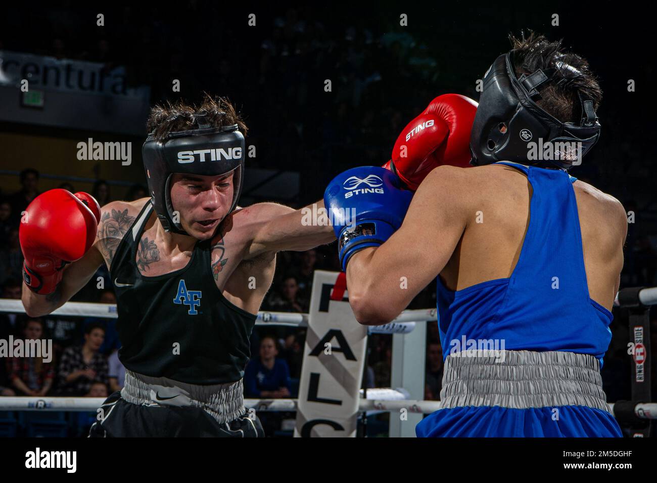 U.S. AIR FORCE ACADEMY, Colo. -- Air Force's Leo Camacho lands a blow ...