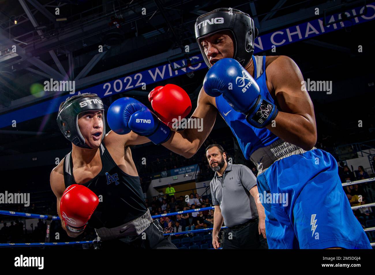 U.S. AIR FORCE ACADEMY, Colo. -- Air Force's Zach Phillips, left, lands ...